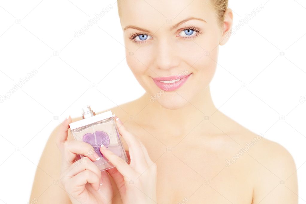 Portrait of a beautiful girl holding a bottle of perfume — Stock Photo ...