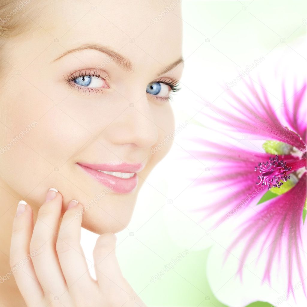 Girl's face and a flower Stock Photo by ©AnmFoto 4282677