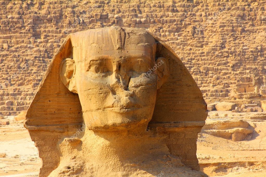 Egypt sphinx face and pyramid in Giza — Stock Photo © Kokhanchikov #5369711