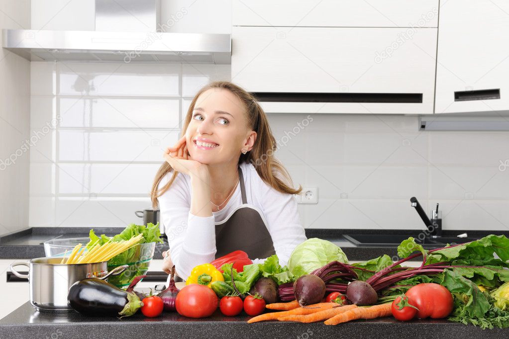Woman cooking Stock Photo by ©haveseen 4160510