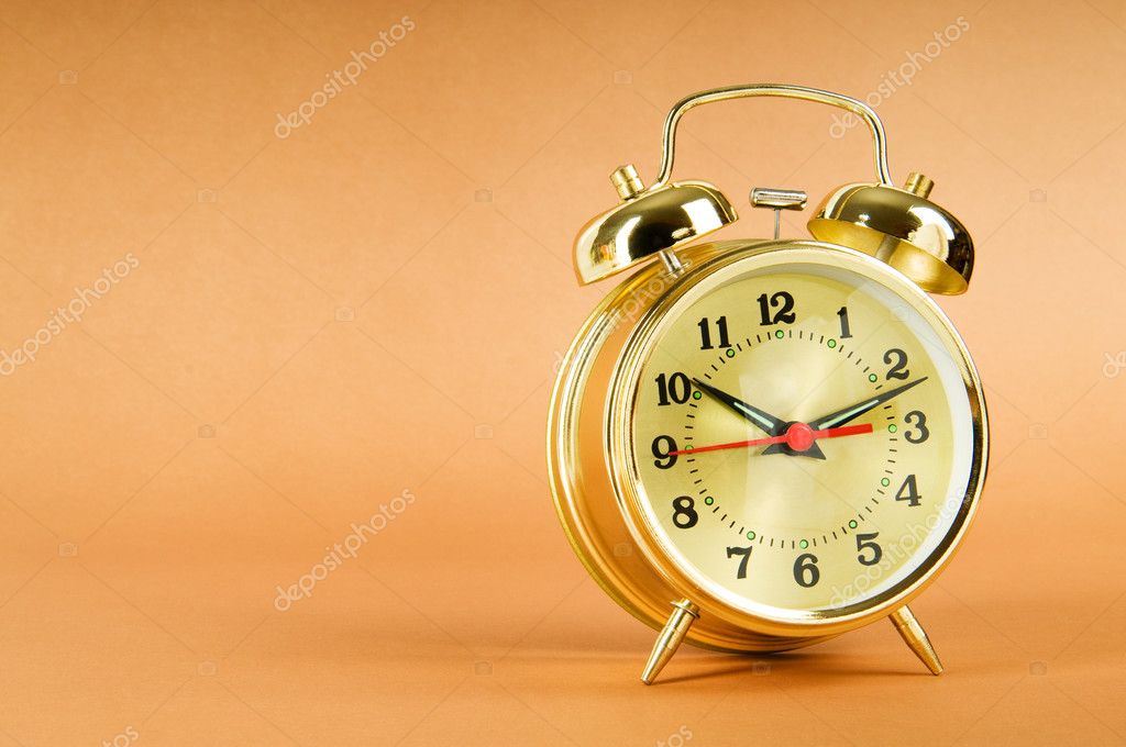 Time concept - alarm clock against colorful background — Stock Photo ...