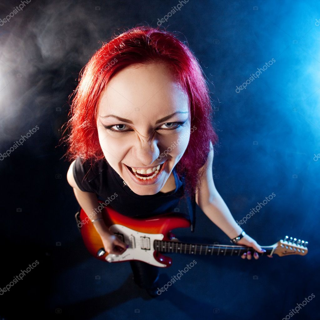 Red-haired girl the guitarist — Stock Photo © KrisCole #4339649