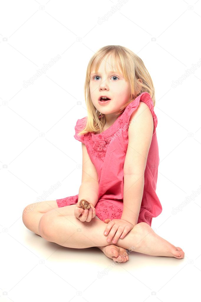 Child with candy on white — Stock Photo © Artmim #4816416
