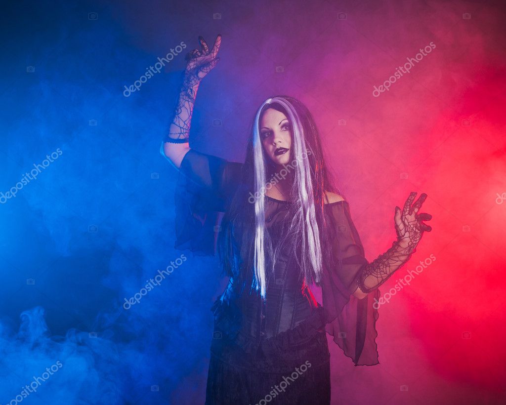 Gothic girl on red-blue smoke background — Stock Photo © mdblk1984 #4123847