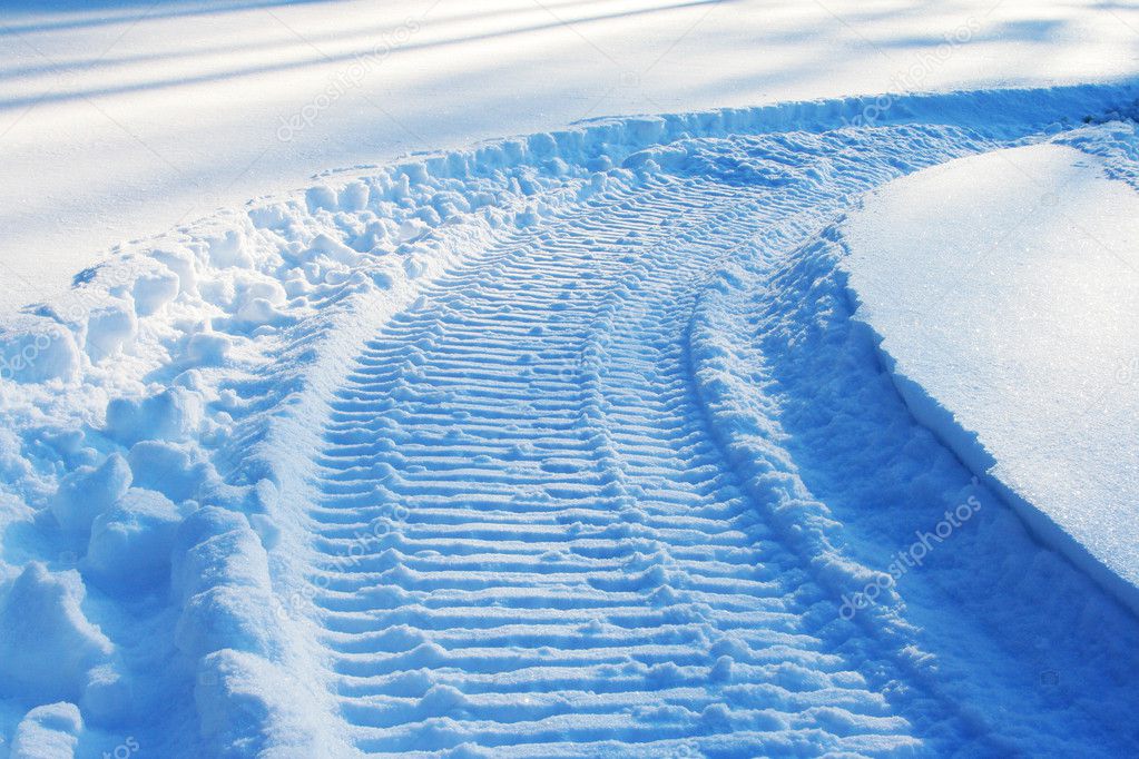 Snowmobile track on snow Stock Photo by ©auriso 4177015