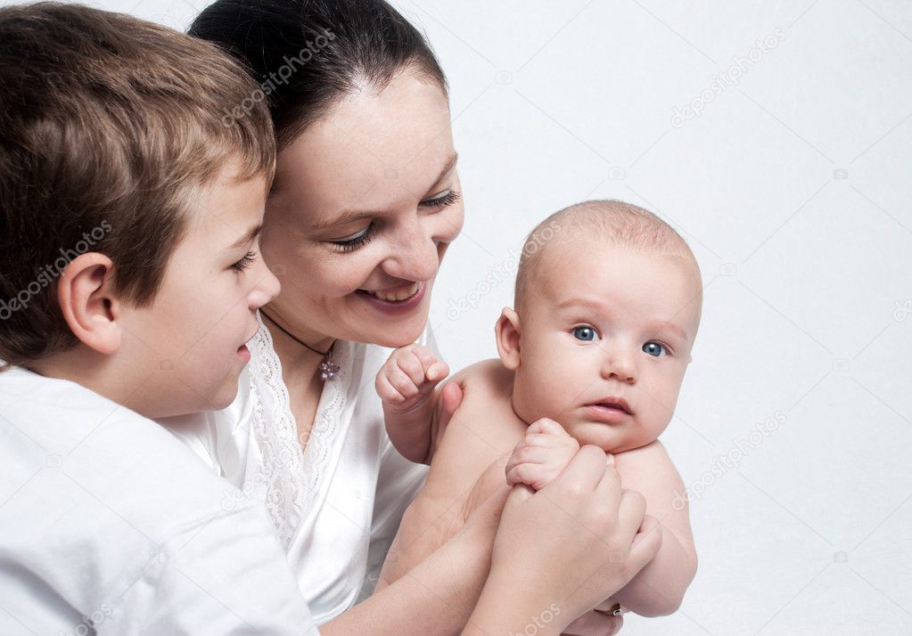 Portrait baby with happy family on light background Stock Photo by ...