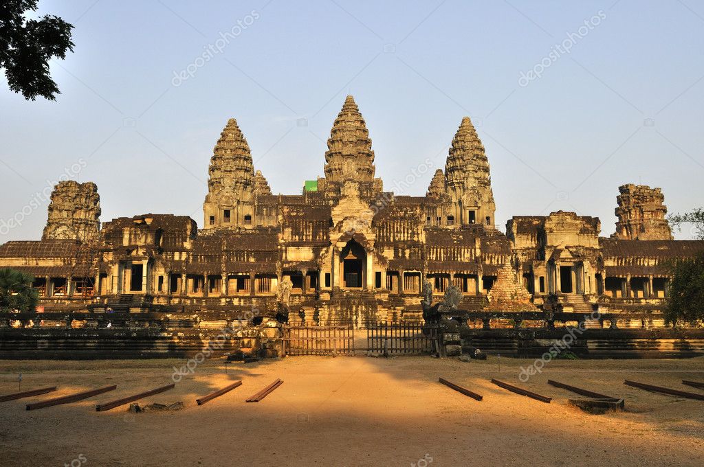 Temple of Angkor Vat in rising sun beams. — Stock Photo © sikaraha #4165660