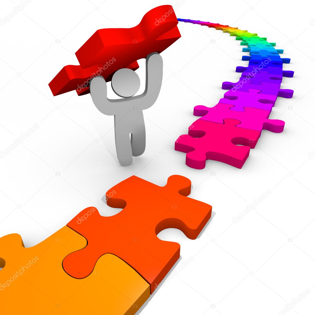 Puzzle - Person Lifts Piece Into Place — Stock Photo © iqoncept #4441000