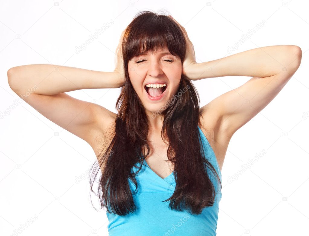 Screaming young woman holding head Stock Photo by ©inarik 4883697