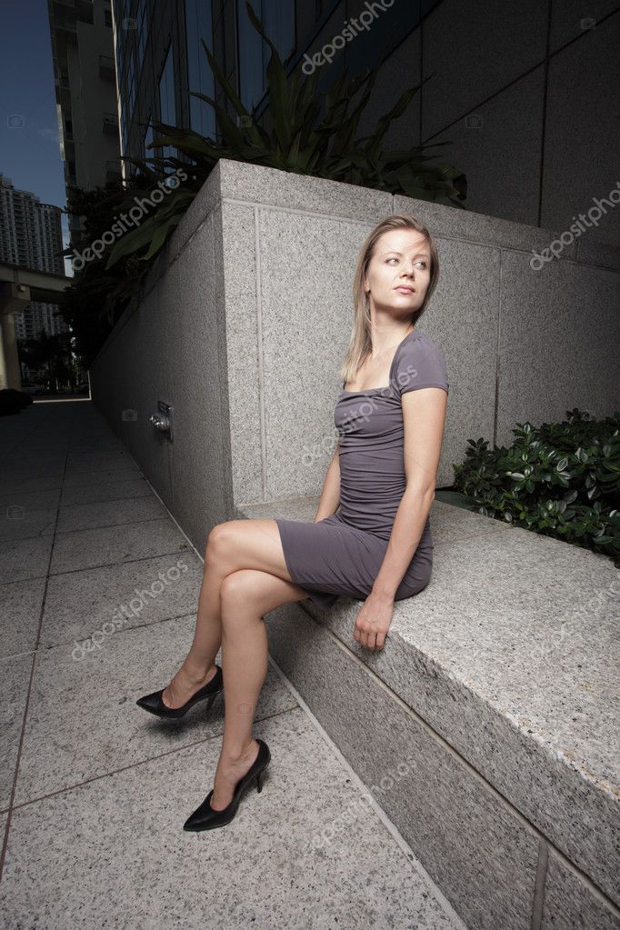 Woman with legs crossed — Stock Photo © felixtm #4216047