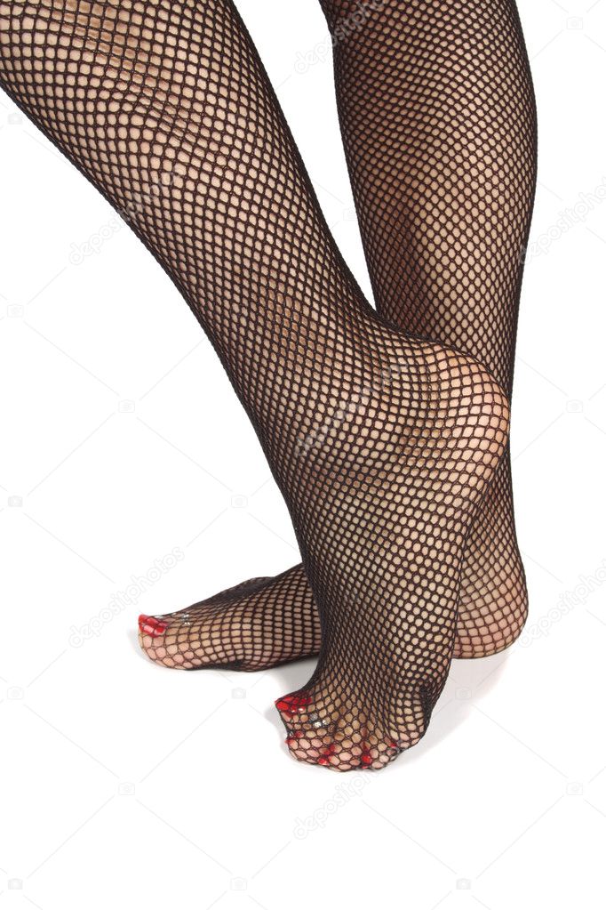 Woman feet with fishnet tights over white background — Stock Photo ...