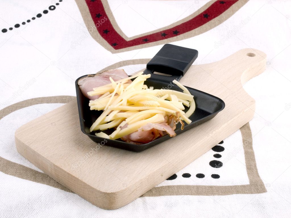 Raclette pan with cheese and ham - party food — Stock Photo ...