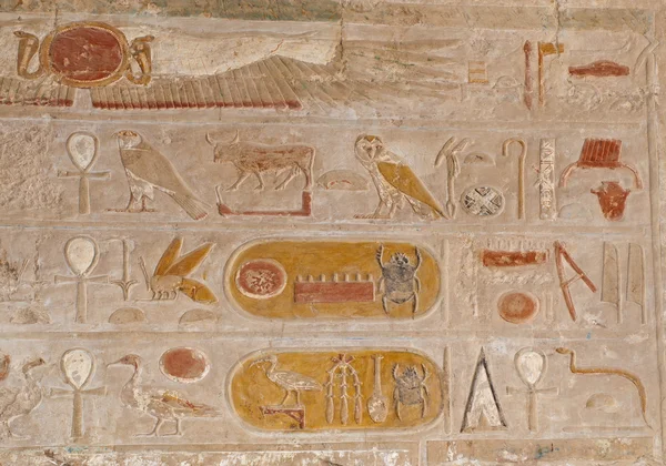 Egyptian hieroglyphic carvings on a temple wall - Stock Image - Everypixel
