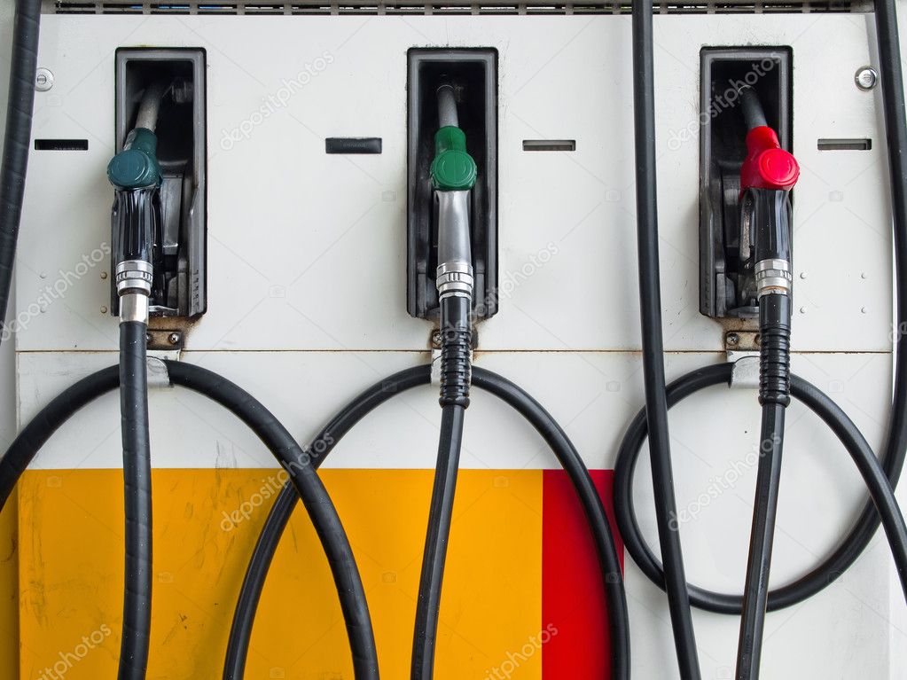 Three Gas Pump Nozzles — Stock Photo © nuttakit #5251477 Three Gas Pump Nozzles — Stock Photo © nuttakit #5251477