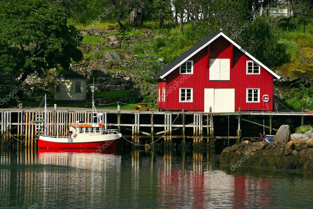 Rorbu and Boat at the Lofoten — Stock Photo © Kartouchken #4924160