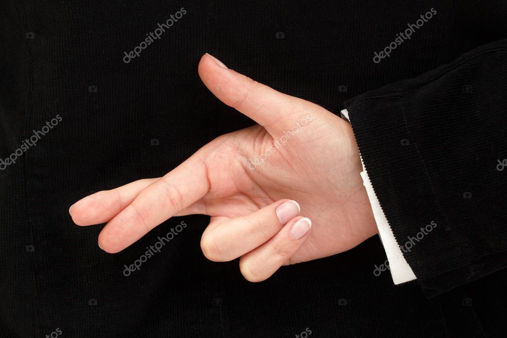 Crossed fingers — Stock Photo © kalozzolak #4256205