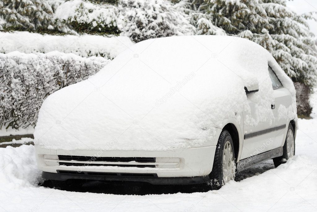 Snow-covered white car — Stock Photo © Smileus #4363201