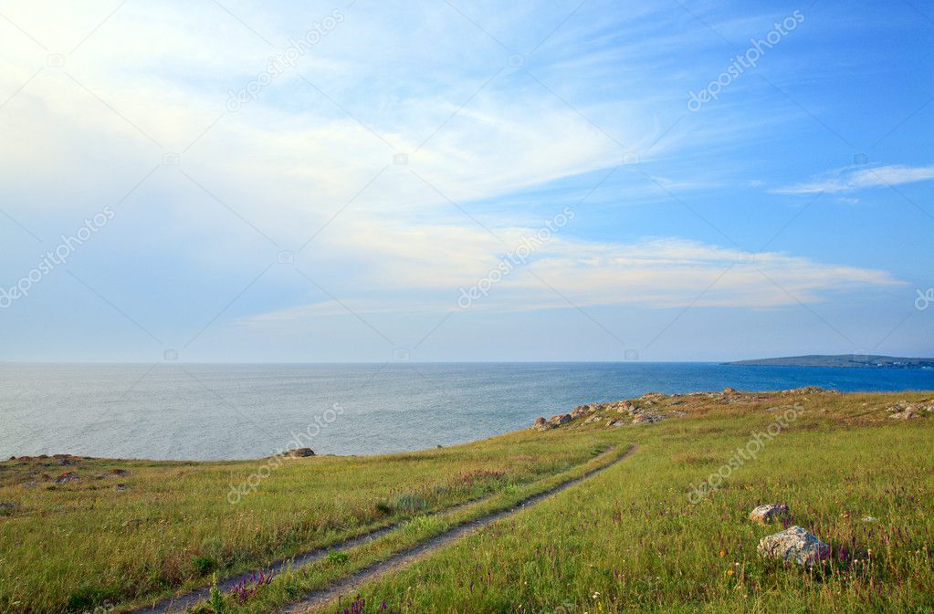 Earth road on prairies near summer sea coast — Stock Photo © wildman ...