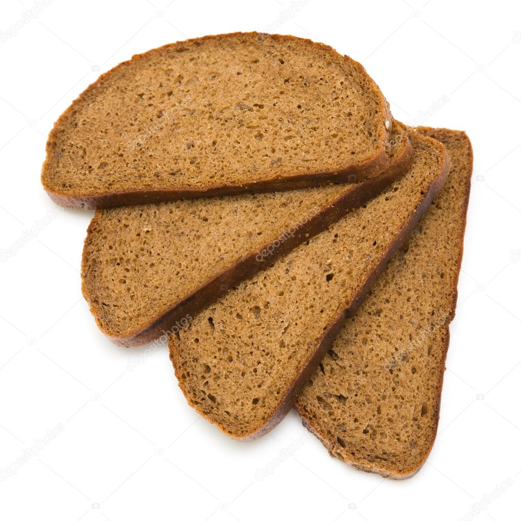 Four stacked fanned slices of rye bread with caraway seeds isolated on ...