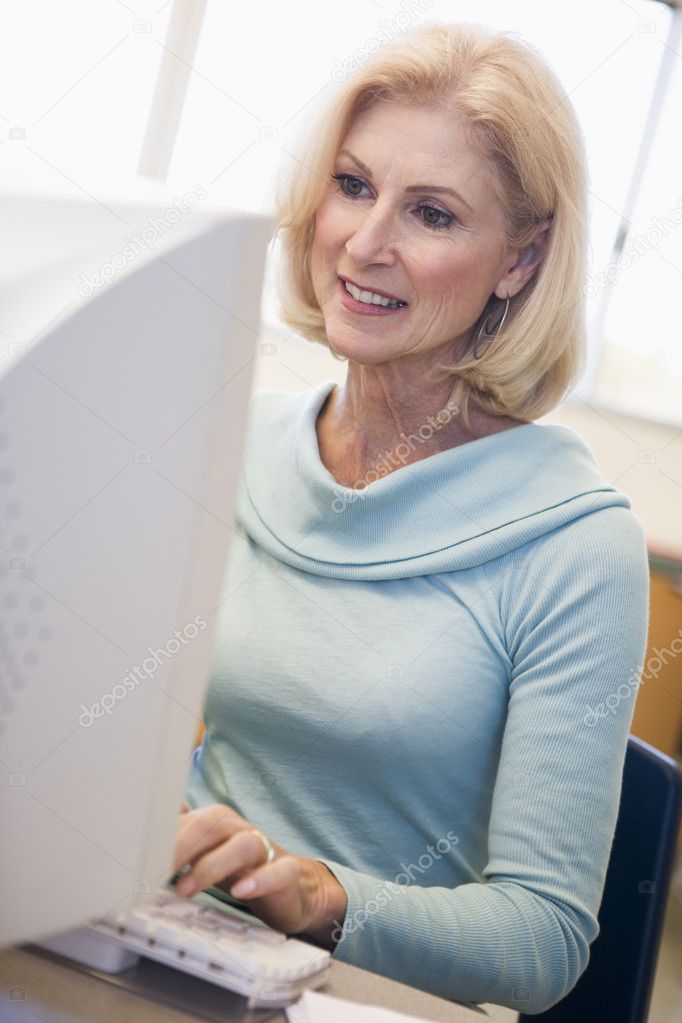 Mature Female Student Learning Computer Skills — Stock Photo ...