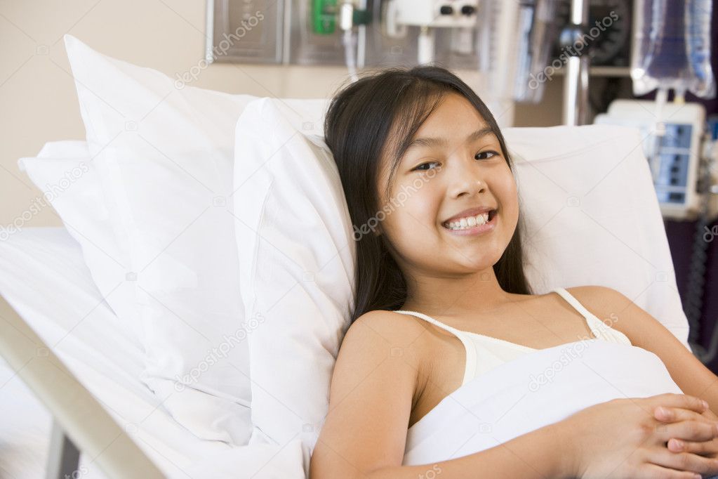 Young Girl Smiling In Hospital Bed — Stock Photo © monkeybusiness #4779592