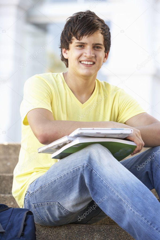 Male Teenage Student Sitting Outside On College Steps Stock Photo by ... Male Teenage Student Sitting Outside On College Steps Stock Photo by ...
