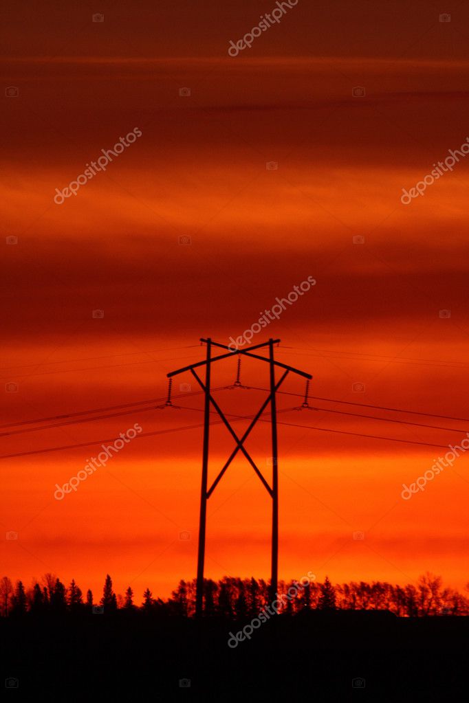 Set sun backlighting farm buildings — Stock Photo © pictureguy #4912104