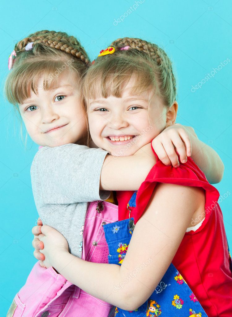 Twin sisters hugging — Stock Photo © avix #5335792