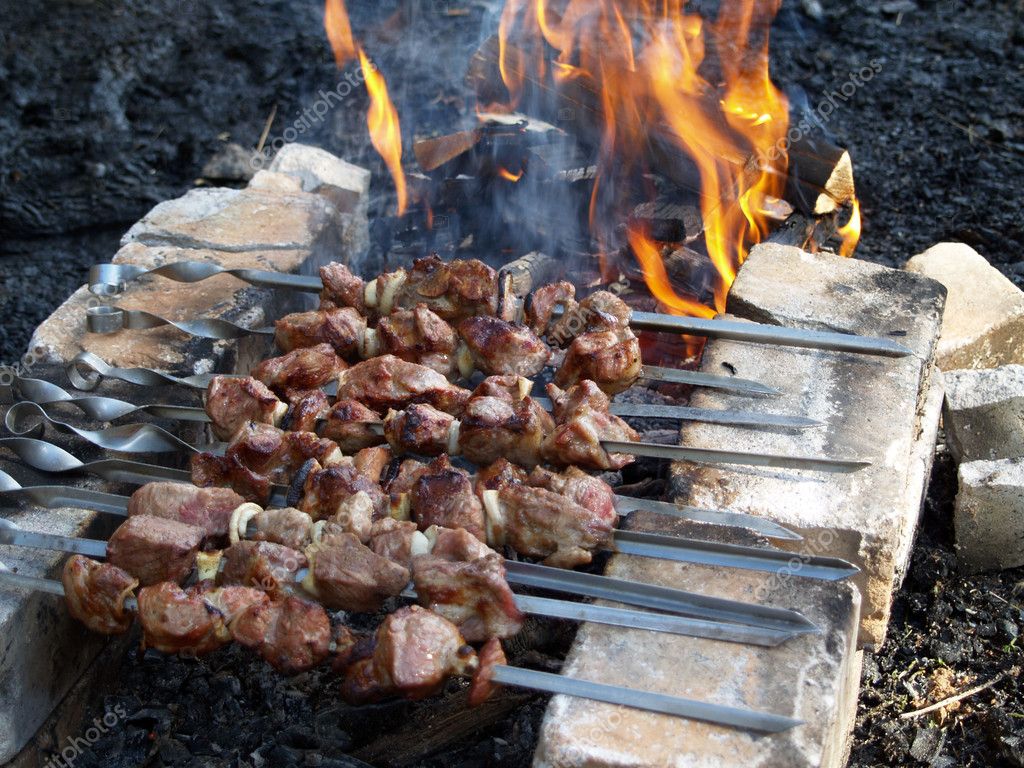 Meat barbecue on open fire — Stock Photo © koltashev #4980507