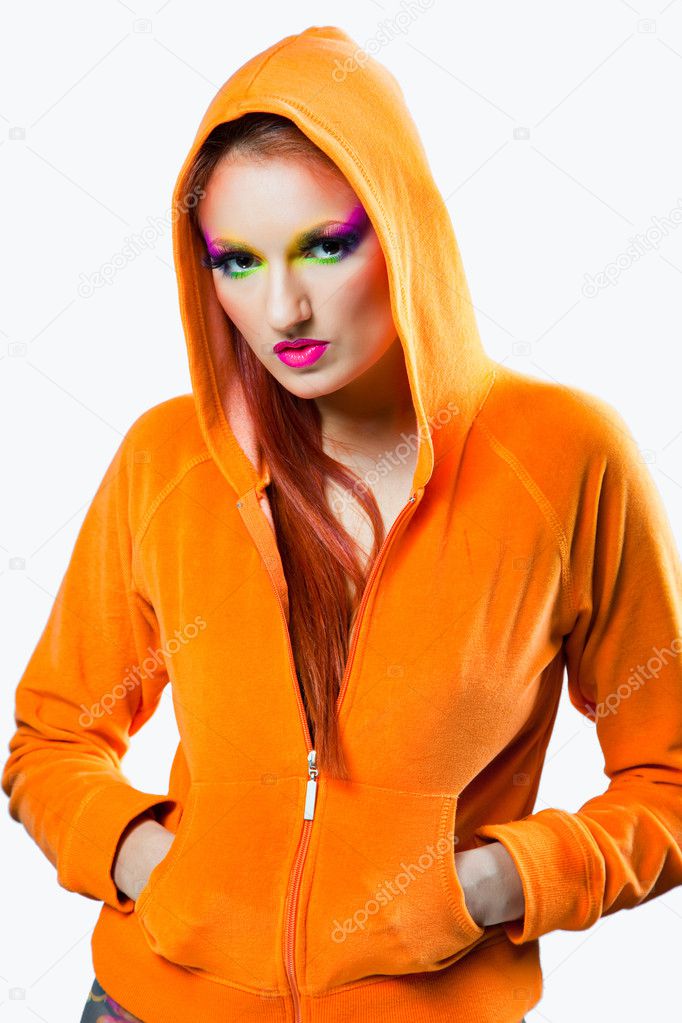 Girl wearing orange jacket with hood — Stock Photo © tanitue #5356942